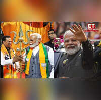 Modi roadshow in Kanpur: With Trishul in hand, PM blesses BJP candidate Ramesh Awasthi for ...